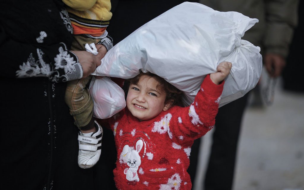 Helping refugee families bundle up | Oxfam