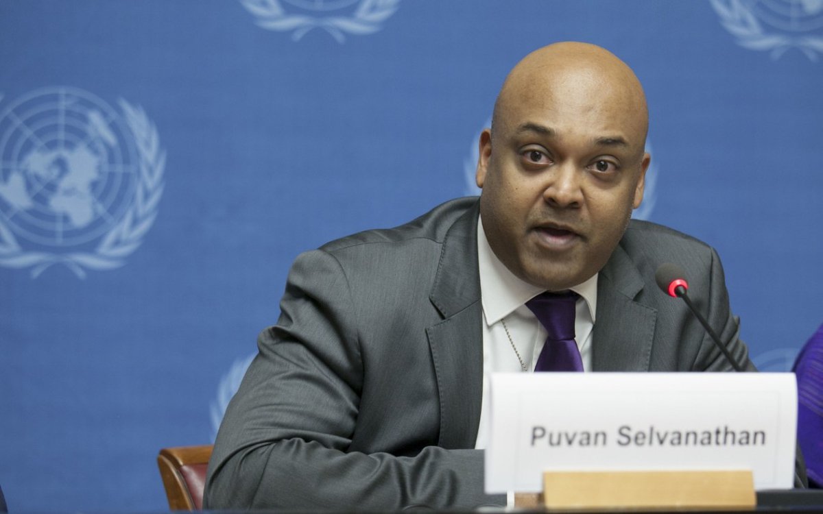Puvan throws a hand grenade | Oxfam